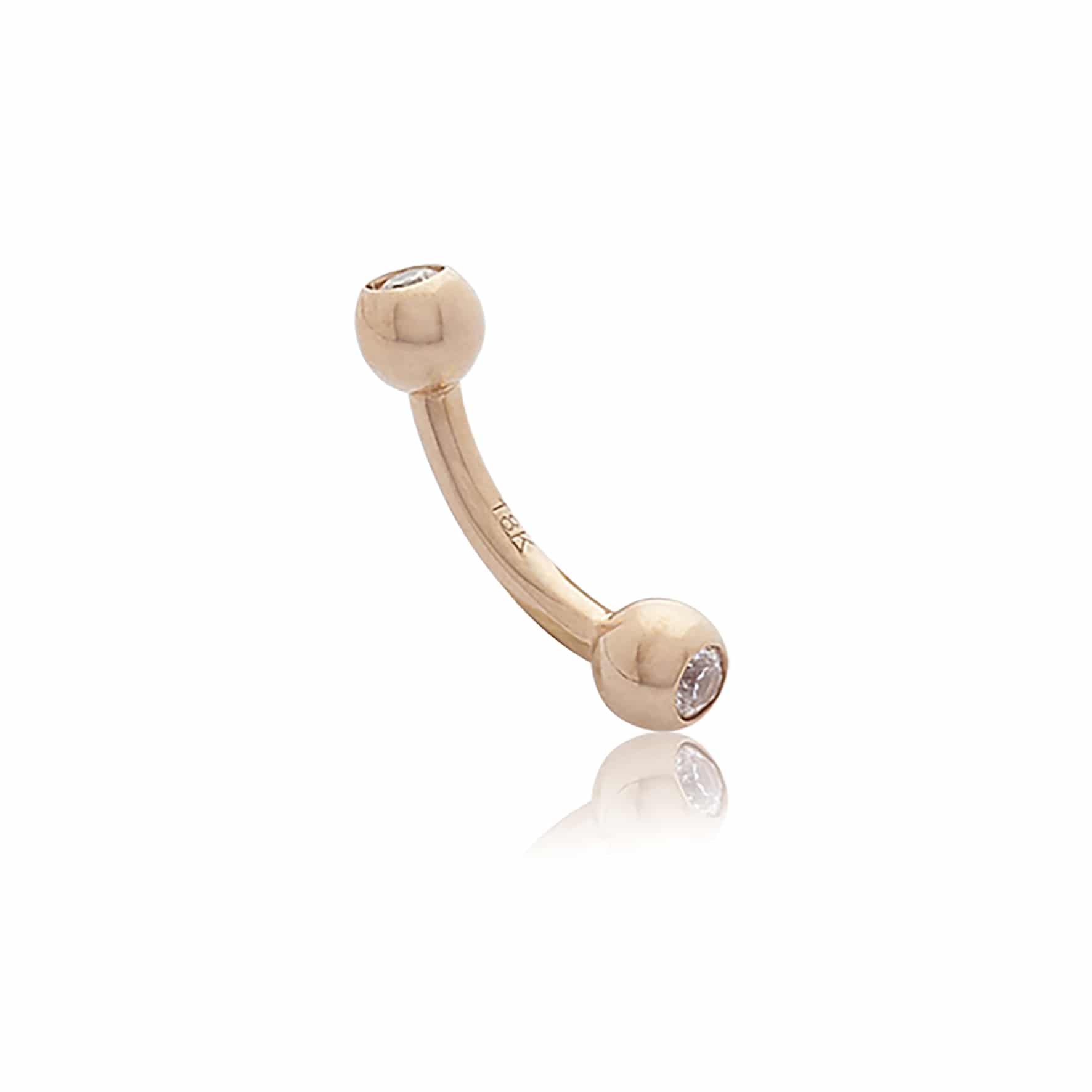 Piercing de nombril en or rose : barre courbe avec boules et zircons